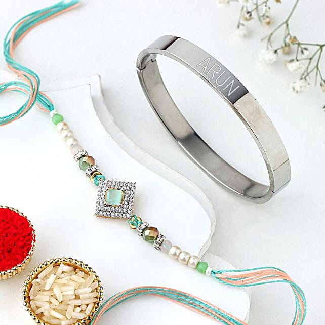 American Diamond Studded Rakhi & Bracelet Combo bahrain | Gift American ...