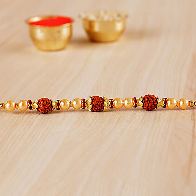 Golden Red Beaded Rudraksh Rakhi japan | Gift Golden Red Beaded ...