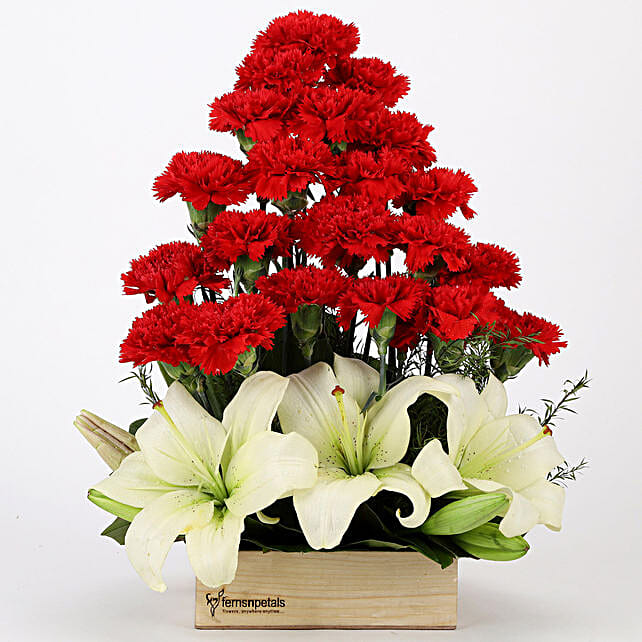 Buy/Send Red Carnations & Lilies Exotic Arrangement Online- FNP