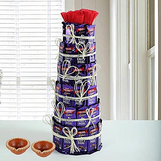 Buy/Send Dairy Milk Tower Diwali Diyas Combo Online- FNP