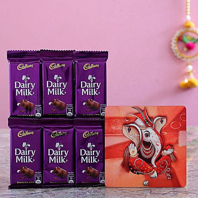 Buy/Send Bright Ganesha Table Top & 6 Dairy Milk Chocolates Combo ...