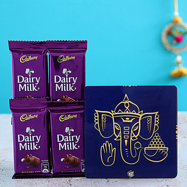 Buy/Send Divine Ganesha Table Top & 4 Dairy Milk Chocolates Combo ...