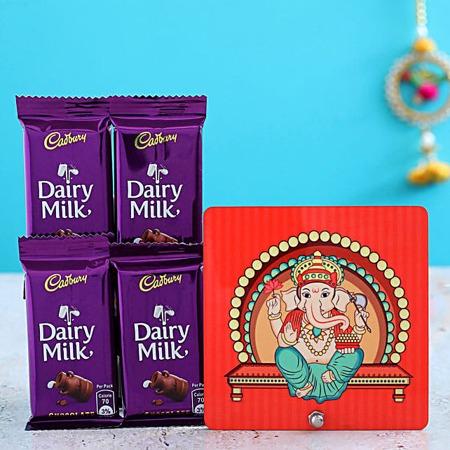 Buy/Send Elegant Ganesha Table Top & 4 Dairy Milk Chocolates Combo ...