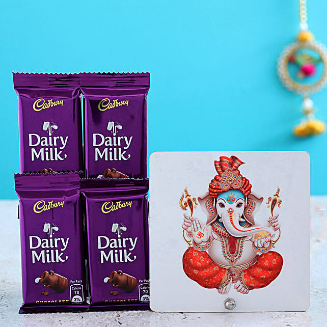 Buy/Send Ganesha Table Top & 4 Dairy Milk Chocolates Combo Online- FNP
