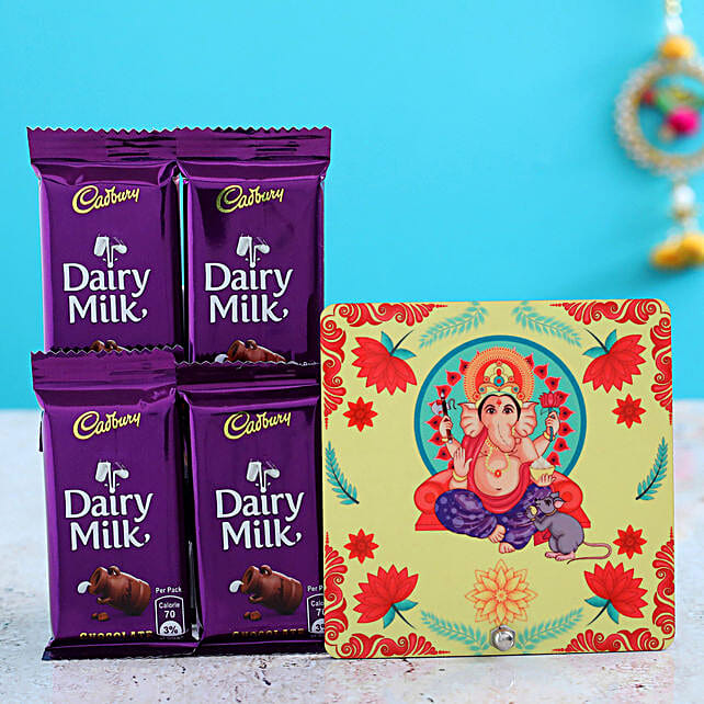 Buy/Send Retro Ganesha Table Top & 4 Dairy Milk Chocolates Combo Online ...