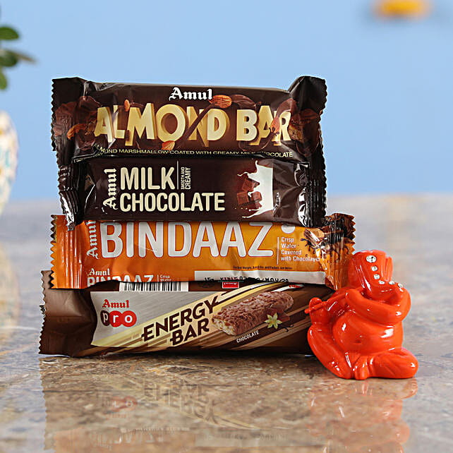 Buy/Send Amul Goodies & Orange Ganesha Idol Combo Online- FNP