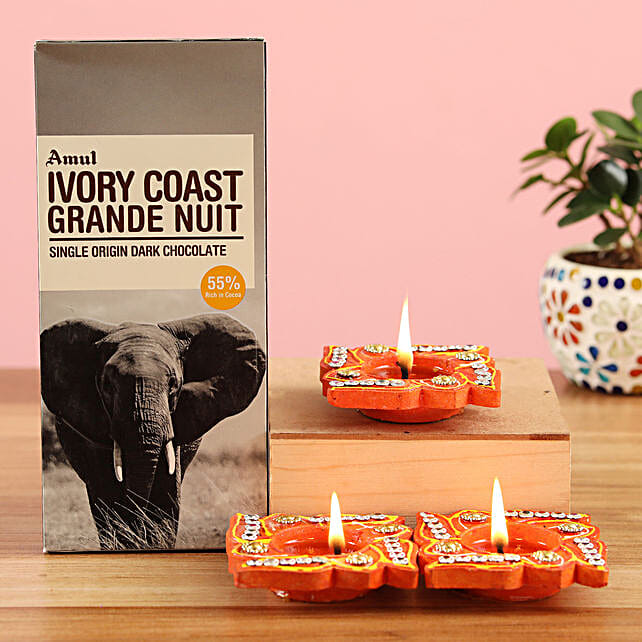 Buy/Send Amul Ivory Coast & Swastik Diya Combo Online- FNP