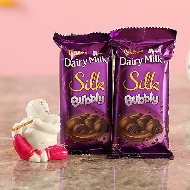 Buy/Send Dairy Milk Silk Bubbly Chocolates & Ganesha Idol Combo Online- FNP