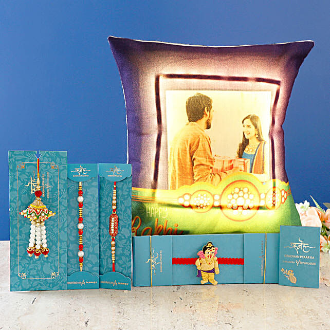 Buy/Send 4 Rakhi Set & Personalised LED Cushion Online- FNP