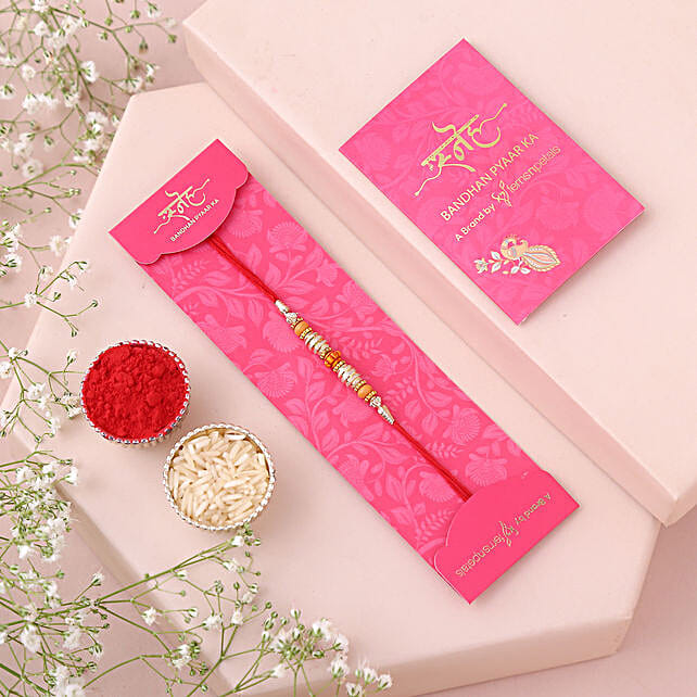 Buy/Send Sneh Gleaming Pearls Designer Rakhi Online- FNP