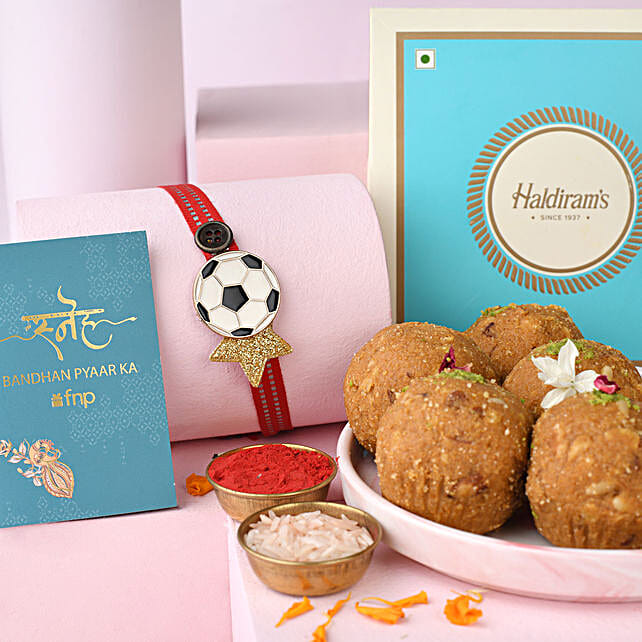 Buy/Send Sneh Football Kids Rakhi with Besan Ladoo Online- FNP