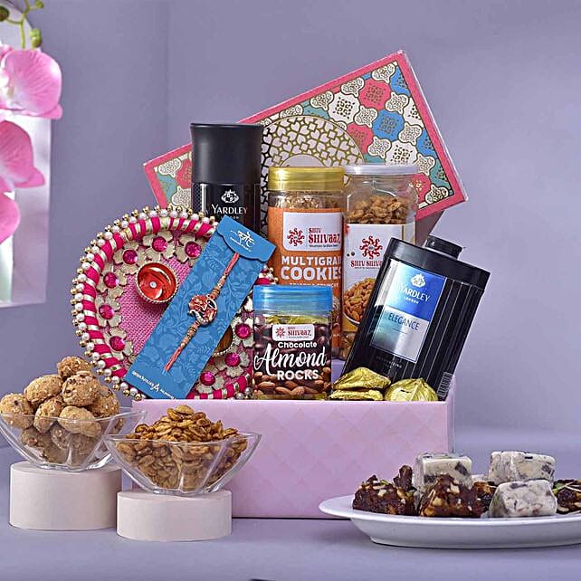 Buy/Send Divine Krishna Rakhi & Yardley Special Hamper Online- FNP