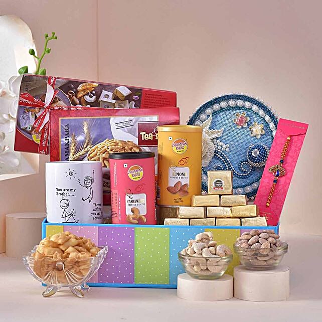 Buy/Send Traditional Rakhi & Snack Attack Hamper Online- FNP