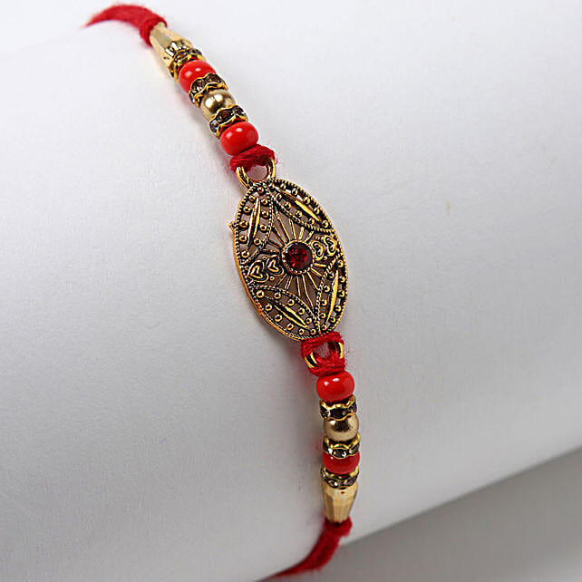 Buy/Send Crismson Heart Rakhi Online- FNP
