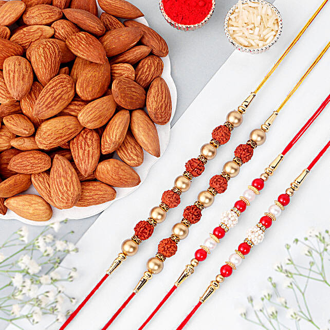 Buy/Send Sacred Threads Rakhi Set Online- FNP