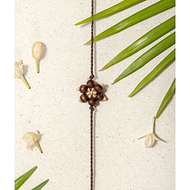 Buy/Send Sacred Chandan Phool Rakhi Online- FNP