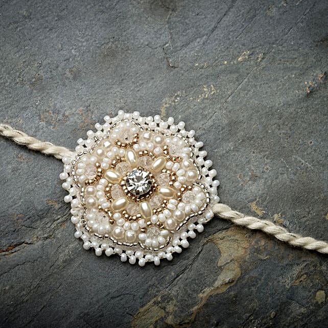 Buy/Send Pearled Grace Aayansh Rakhi Online- FNP