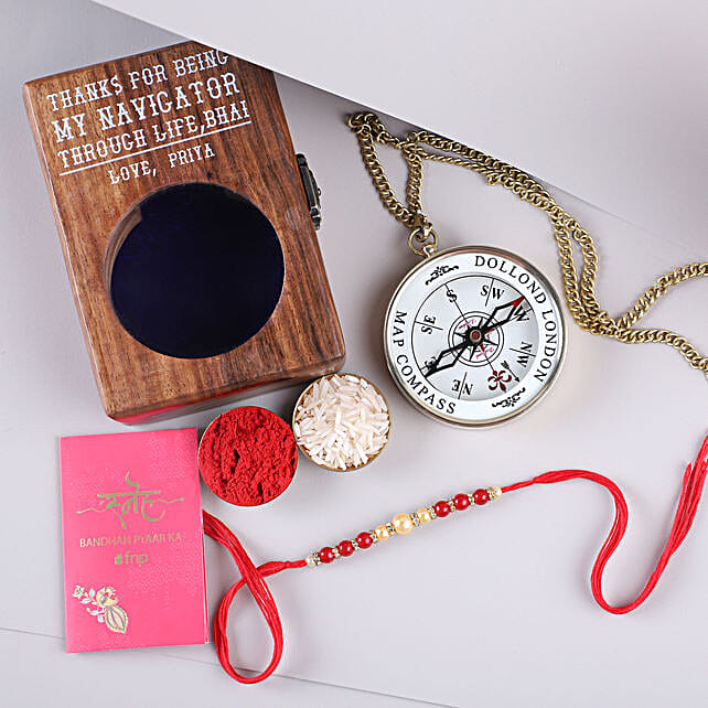 Sneh Pearl Rakhi & Personalised Compass Box spain | Gift Sneh Pearl ...