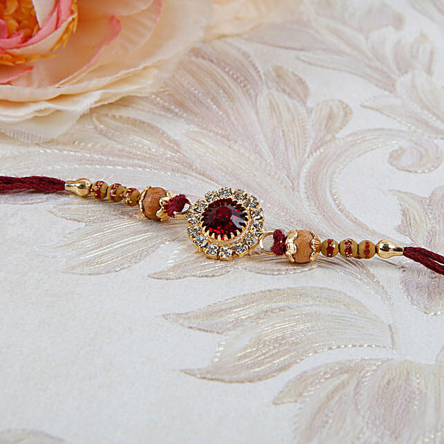 Maroon Ruby Diamond Rakhi sweden | Gift Maroon Ruby Diamond Rakhi- FNP