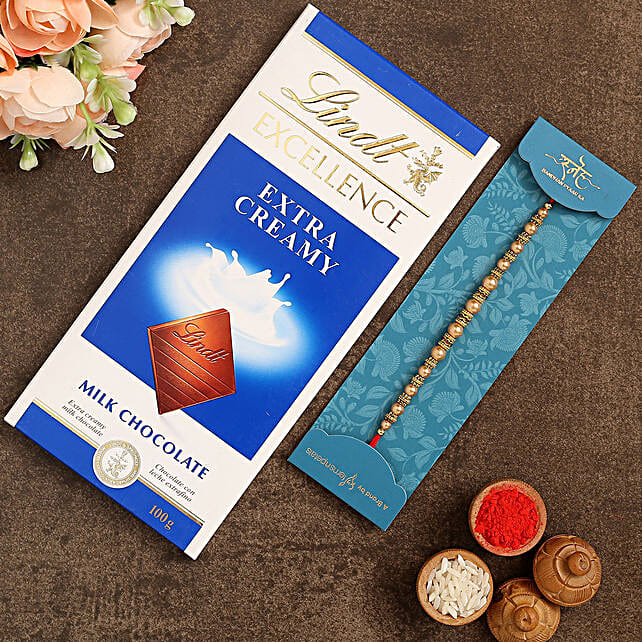 Traditional Pearl And Mauli Rakhi With Lindt sweden | Gift Traditional ...