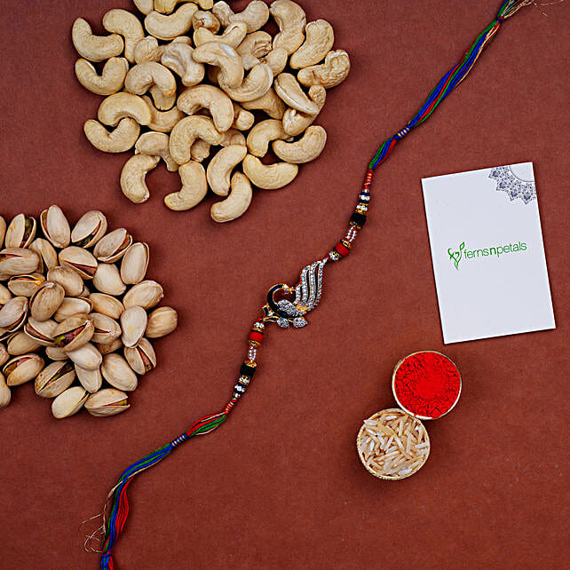Beautiful Peacock Rakhi And Dry Fruits Combo uae | Gift Beautiful ...