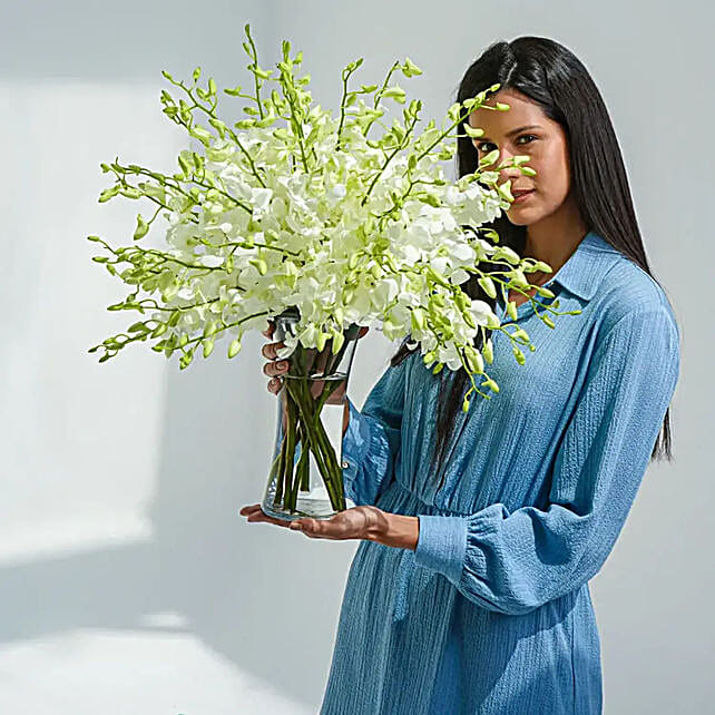 38 White Orchid Arrangement uae | Gift 38 White Orchid Arrangement- FNP