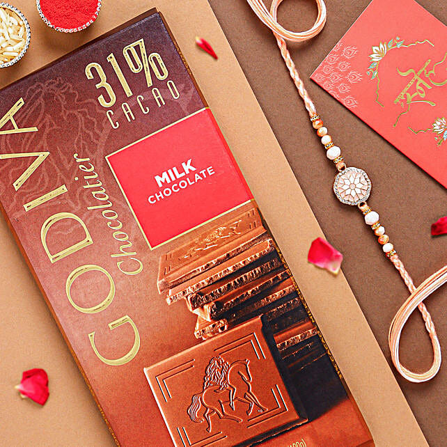 Rosy American Diamond Rakhi & Chocolate Combo uk | Gift Rosy American ...