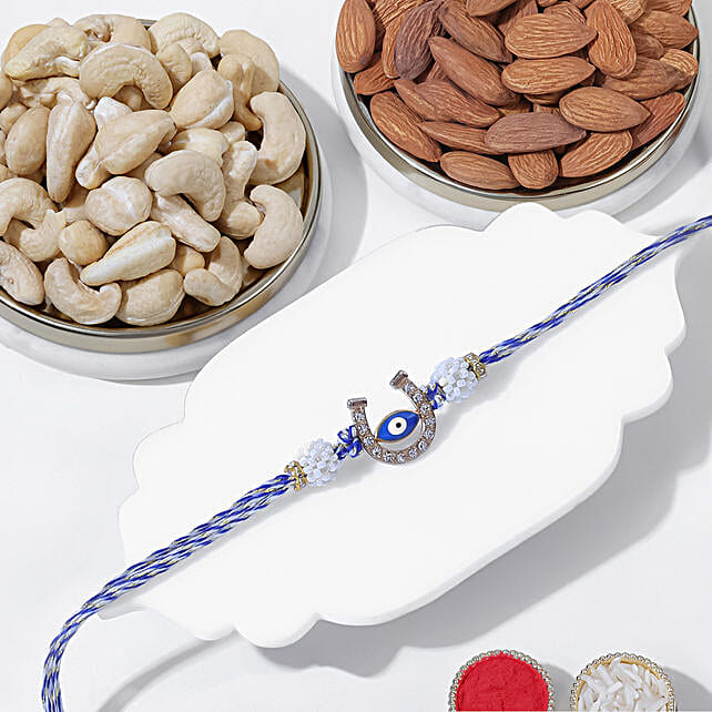 Evil Eye Rakhi with Almonds N Cashews uk | Gift Evil Eye Rakhi with ...