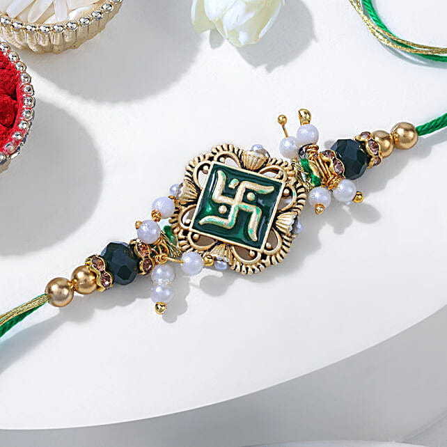 Sacred Swastik Designer Rakhi usa | Gift Sacred Swastik Designer Rakhi- FNP